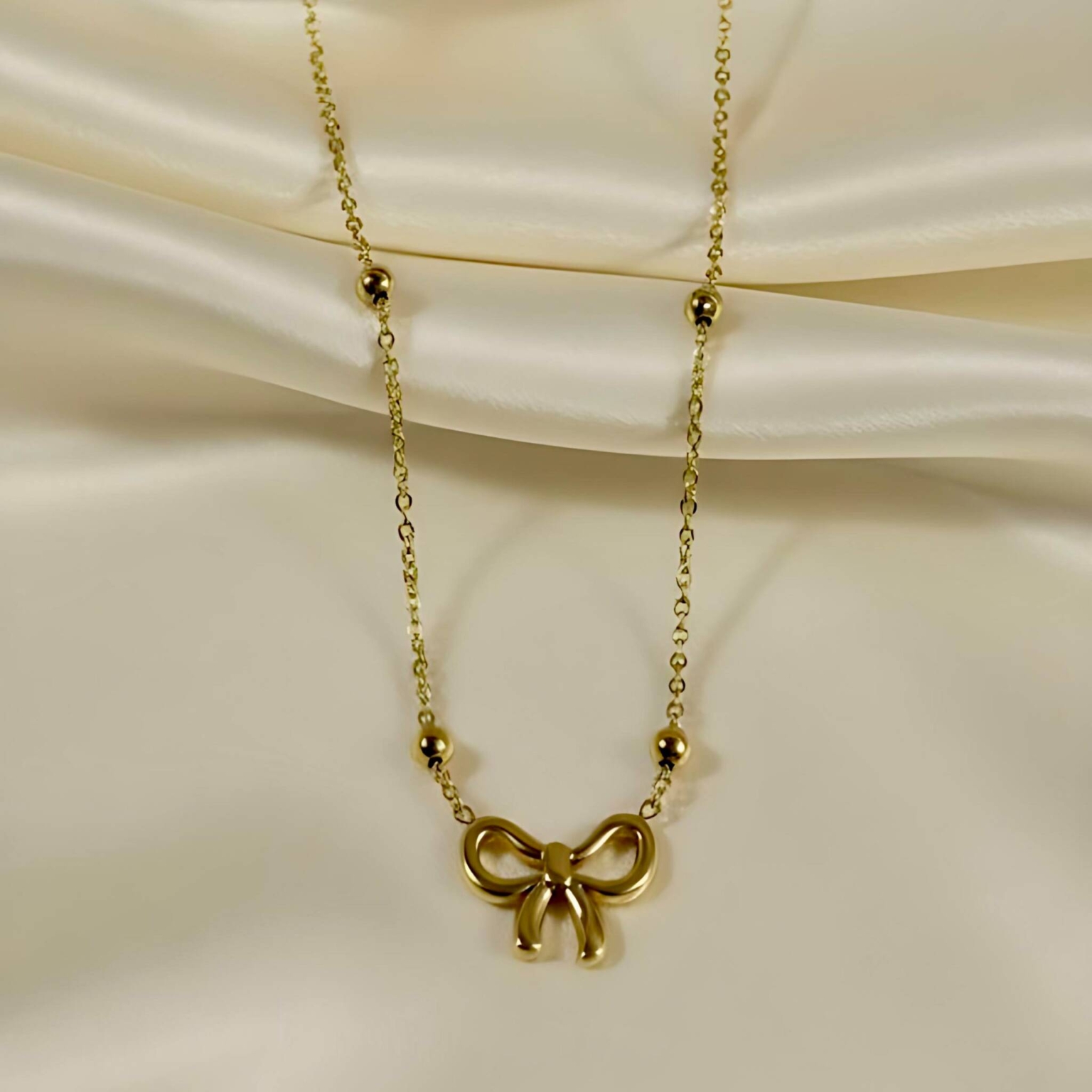 Gold Bow Necklace with Beaded Chain - Feminine Charm Jewellery
